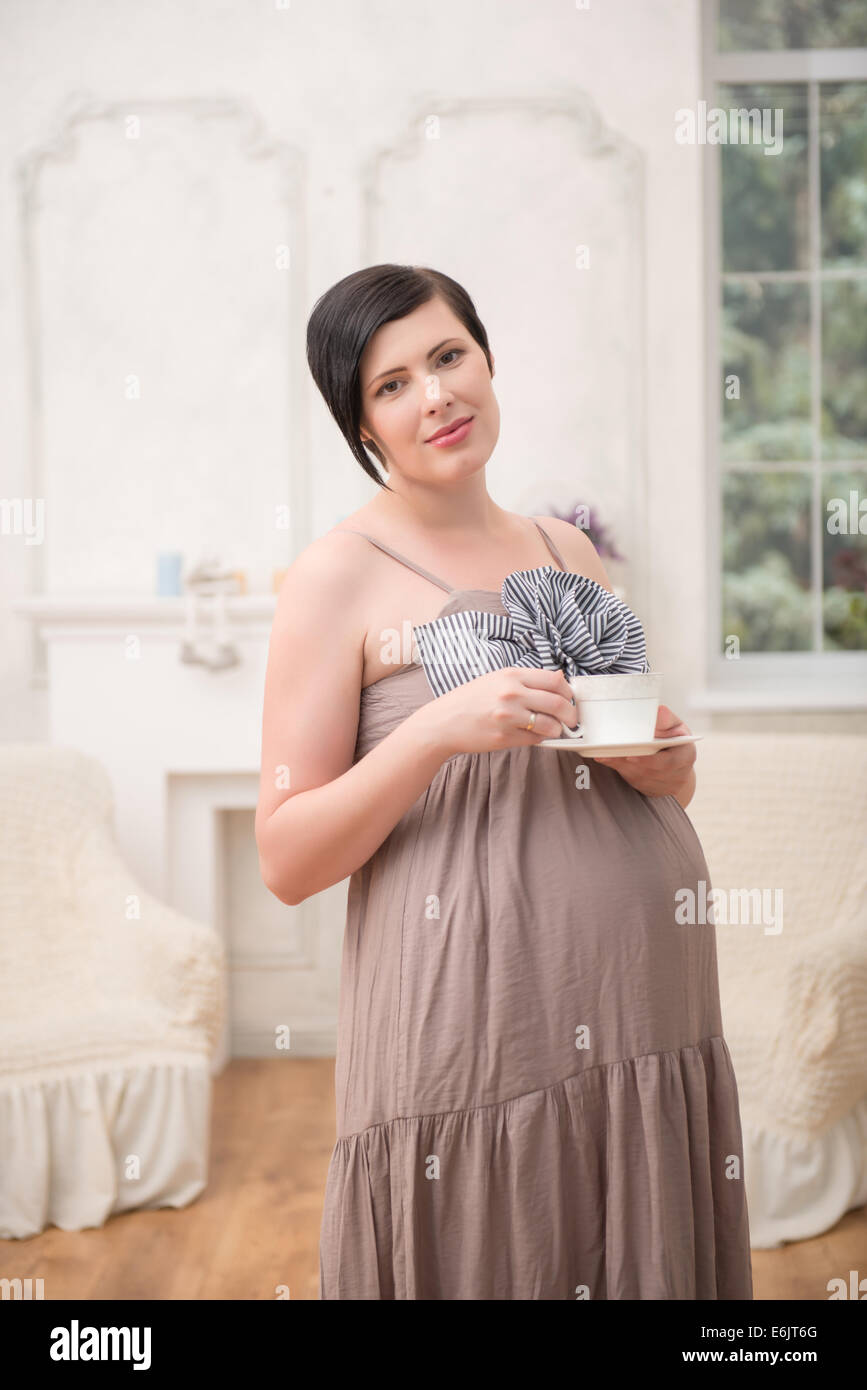 Pregnant woman expecting her baby Stock Photo - Alamy