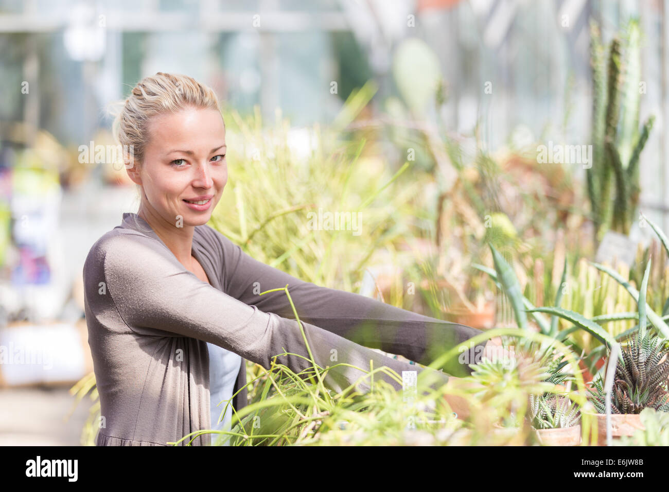 Tropical greenhouse girl hi-res stock photography and images - Alamy
