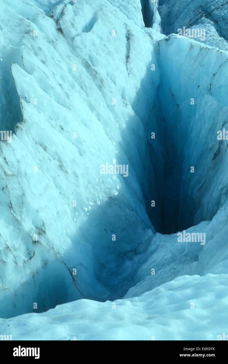 Deep vertical crevasse in the Franz Josef glacier, New Zealand South ...