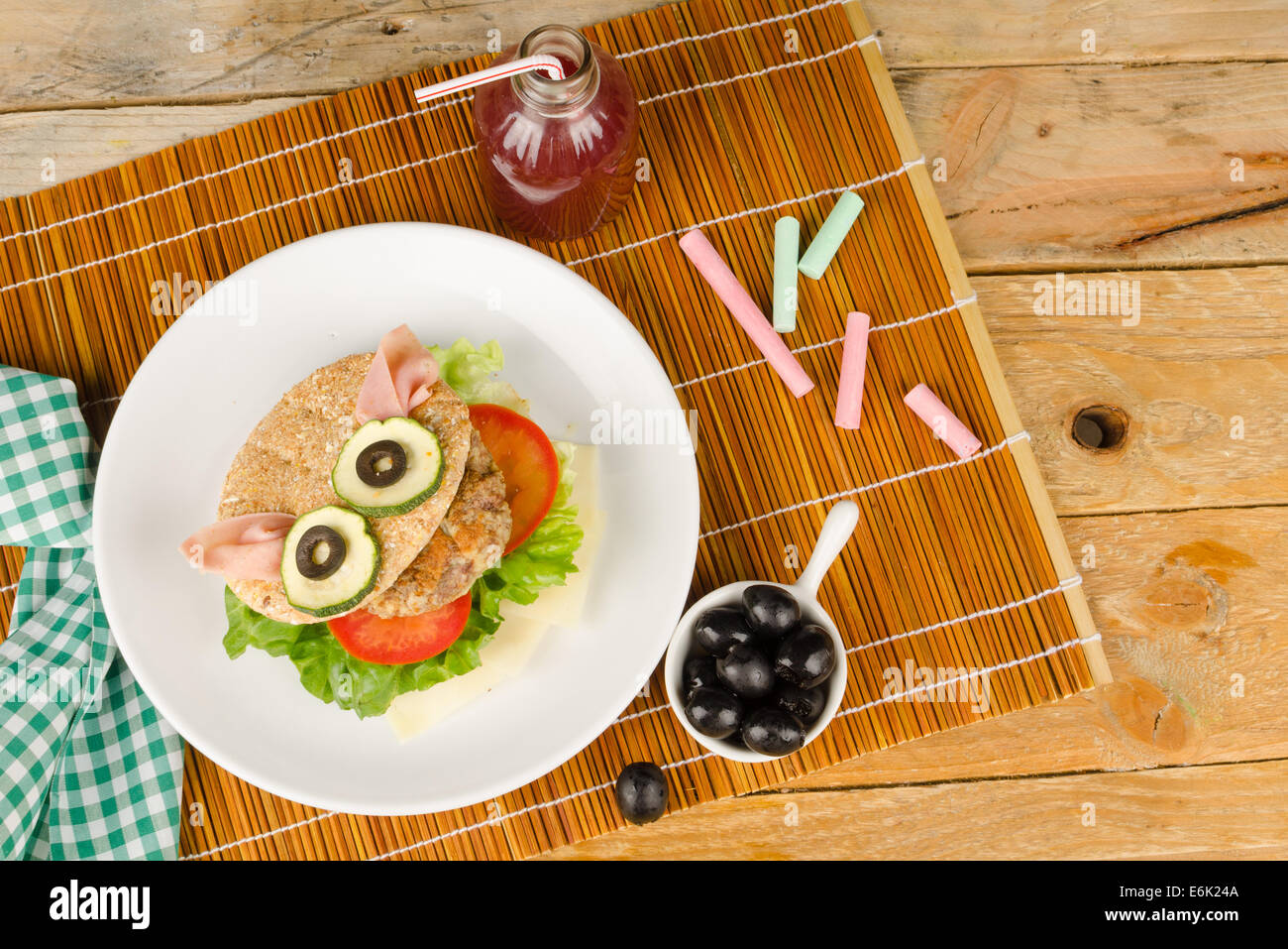 Funny burger decorated as a face, kid food Stock Photo - Alamy