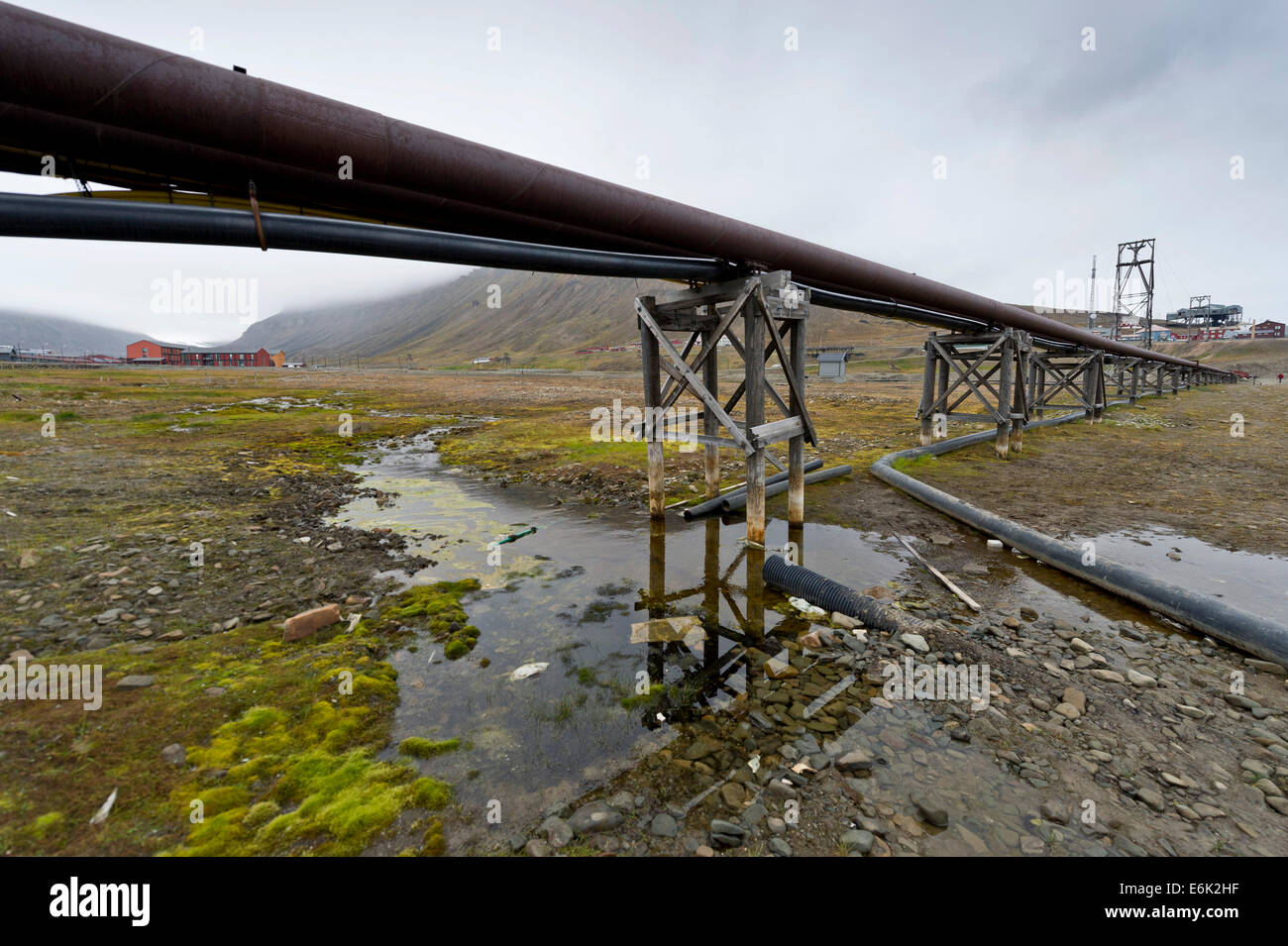 Utility pipes and supply lines installed above ground because of the ...