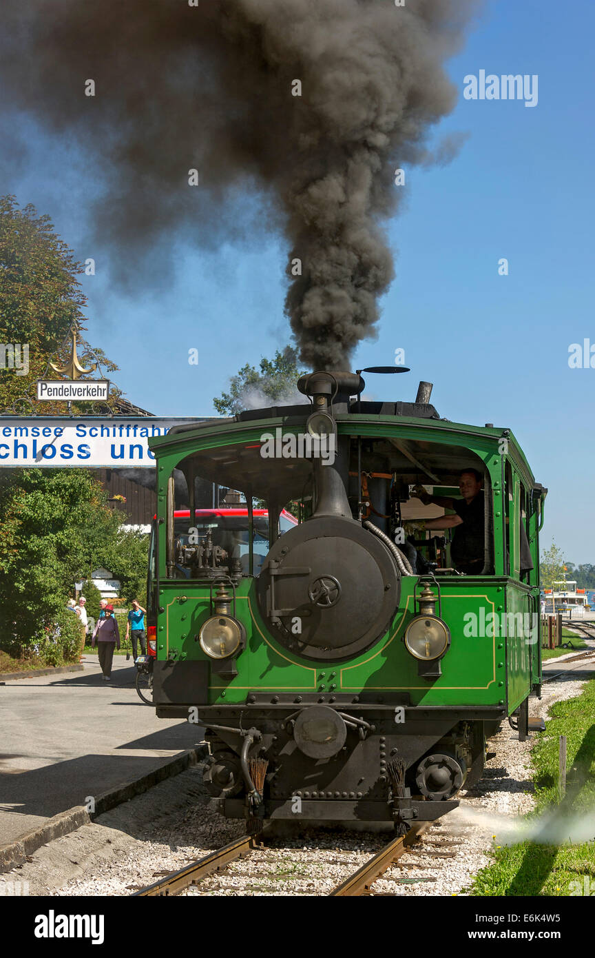 Steam locomotive with black smoke, historical Chiemsee train, Prien am ...