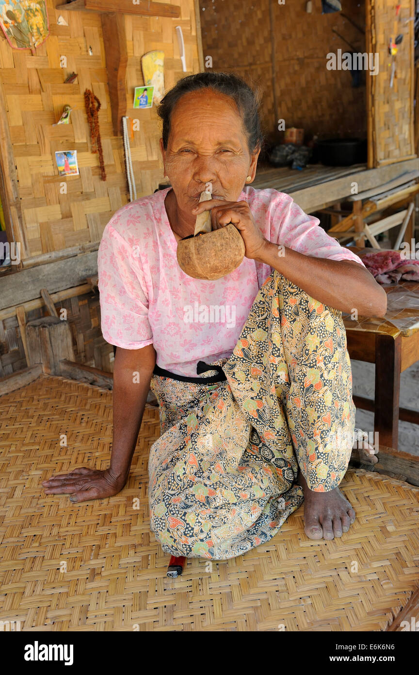 Woman smoking a cheroot cigar hi-res stock photography and images - Alamy