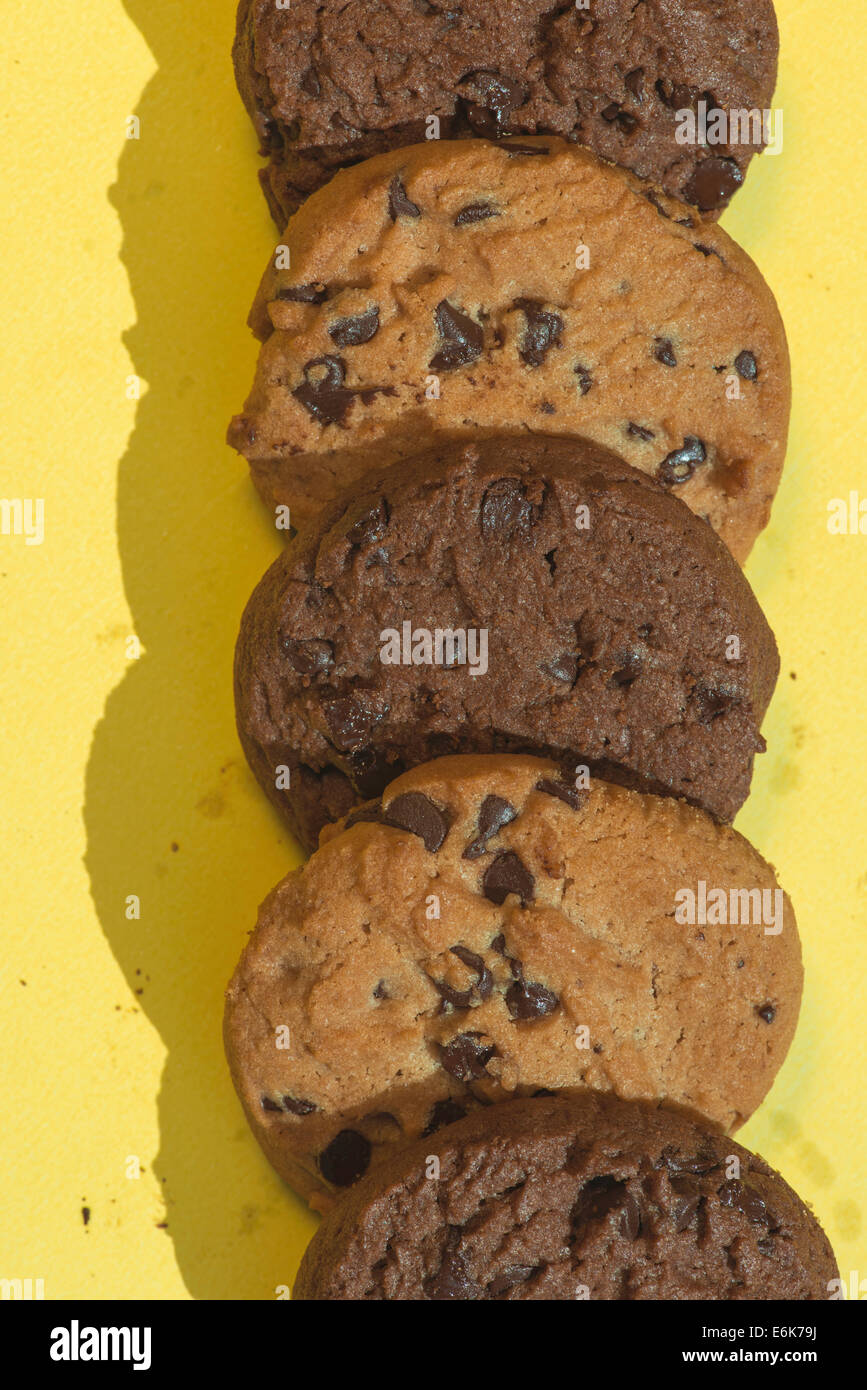 Biscuits on yellow background. Day light Stock Photo - Alamy