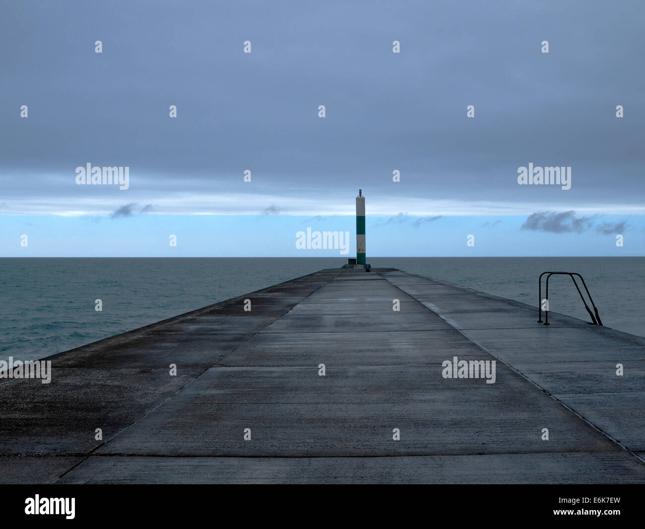 Stone jetty with beacon and steps in Aberystwyth Ceredigion Wales UK ...