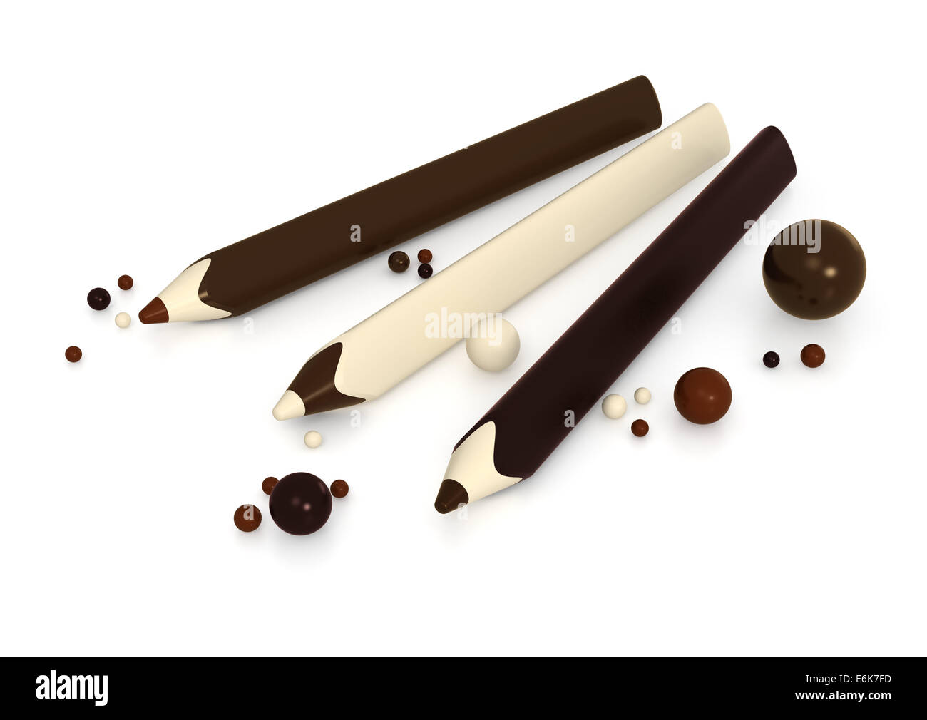 Different chocolate pencils and balls on white background for different ...