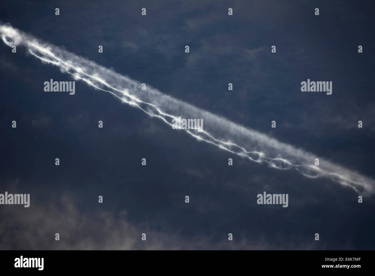 Contrails with interruptions, Germany Stock Photo - Alamy