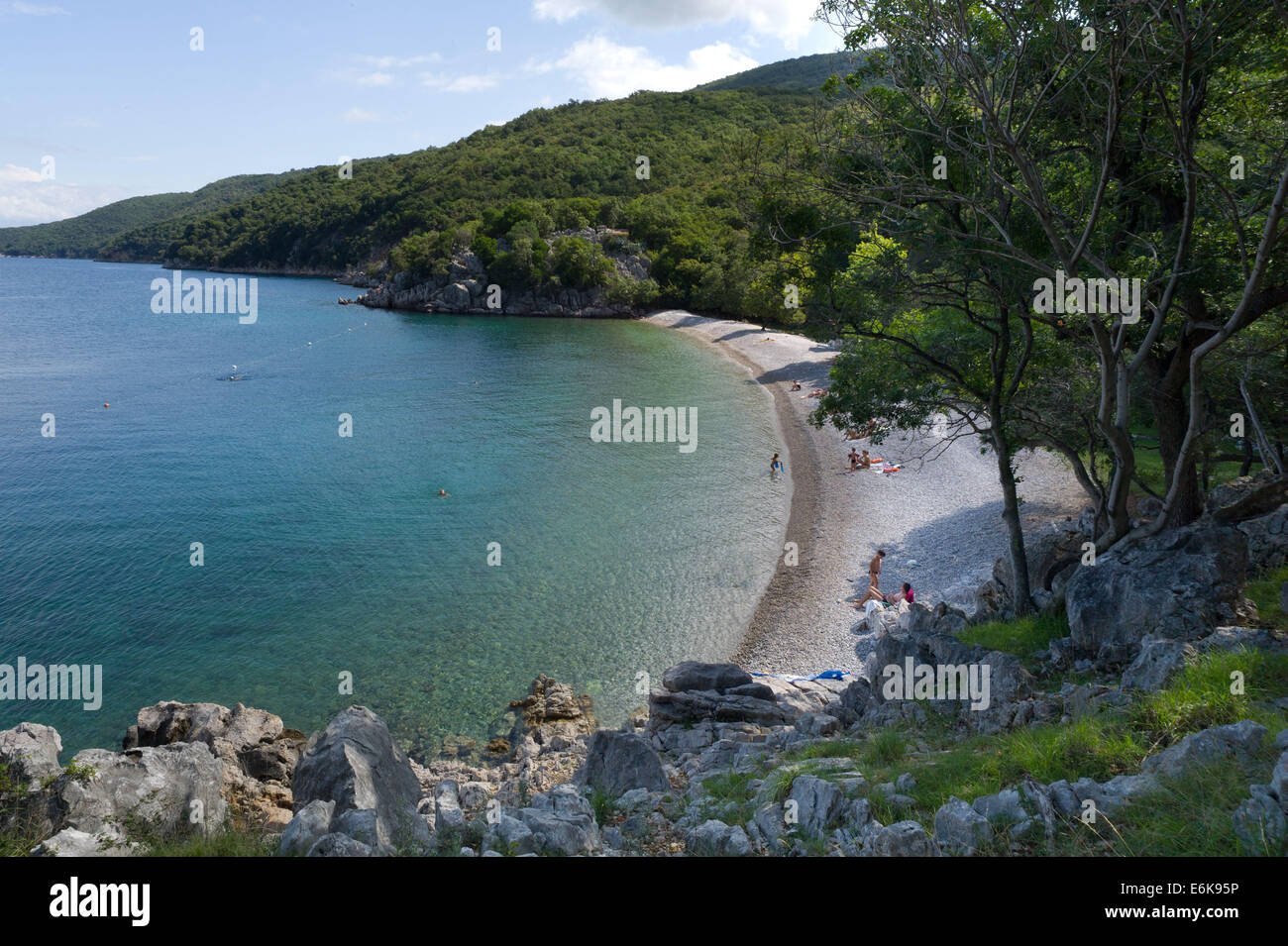 The beach at Porozina village at the north end of the island of Cres ...