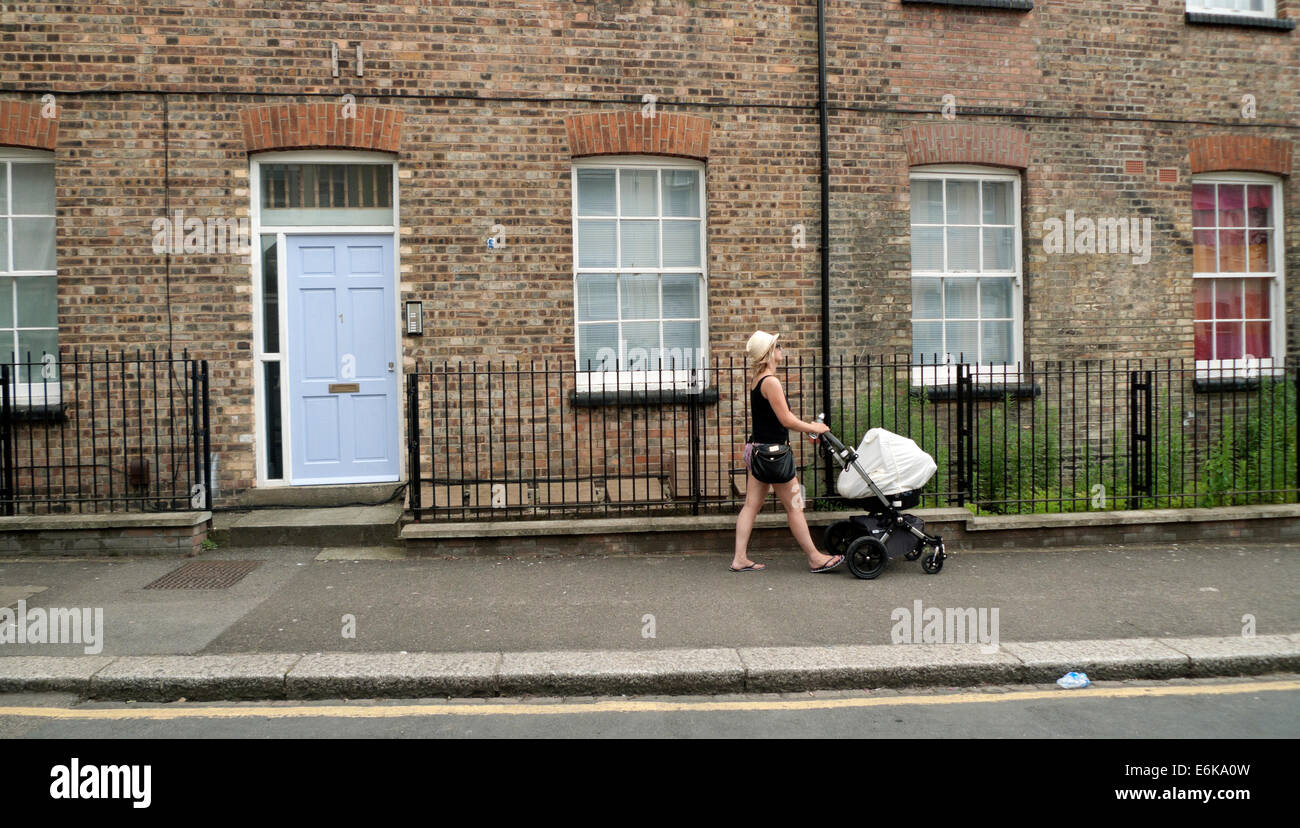 Woman Pushing A Pram Stock Photos & Woman Pushing A Pram Stock Images ...