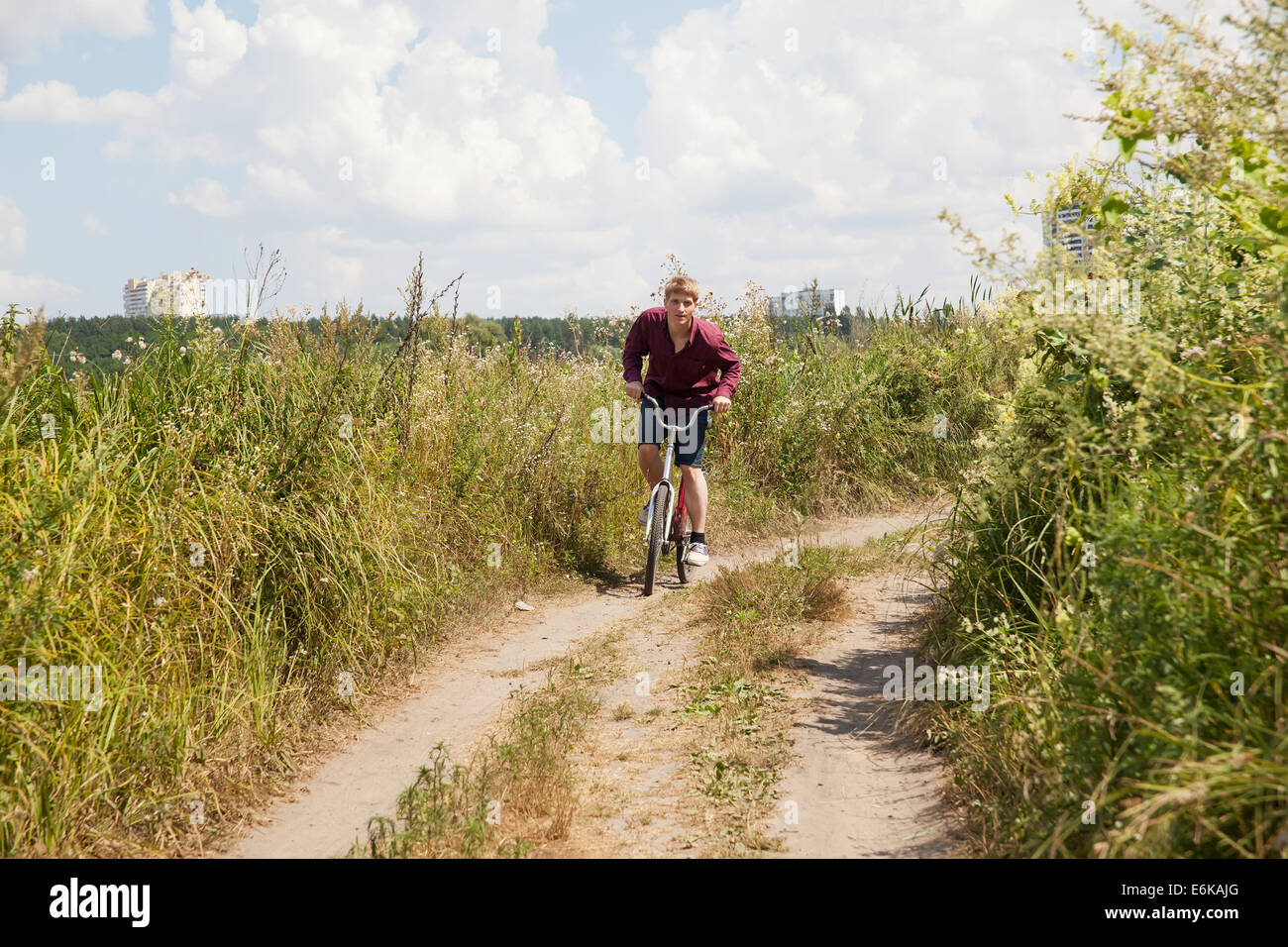 Man riding bike in nature hi-res stock photography and images - Alamy