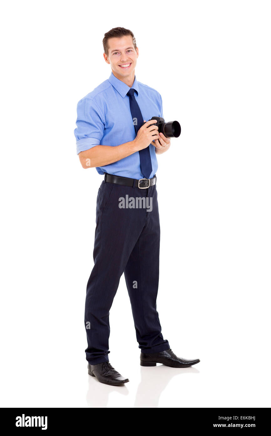 good looking photographer standing on white background Stock Photo - Alamy