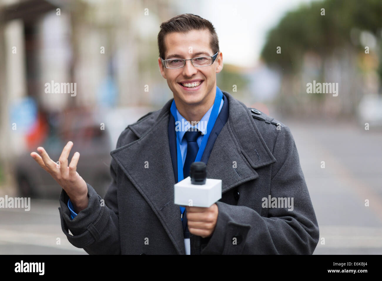 cheerful weather reporter in live broadcast Stock Photo - Alamy