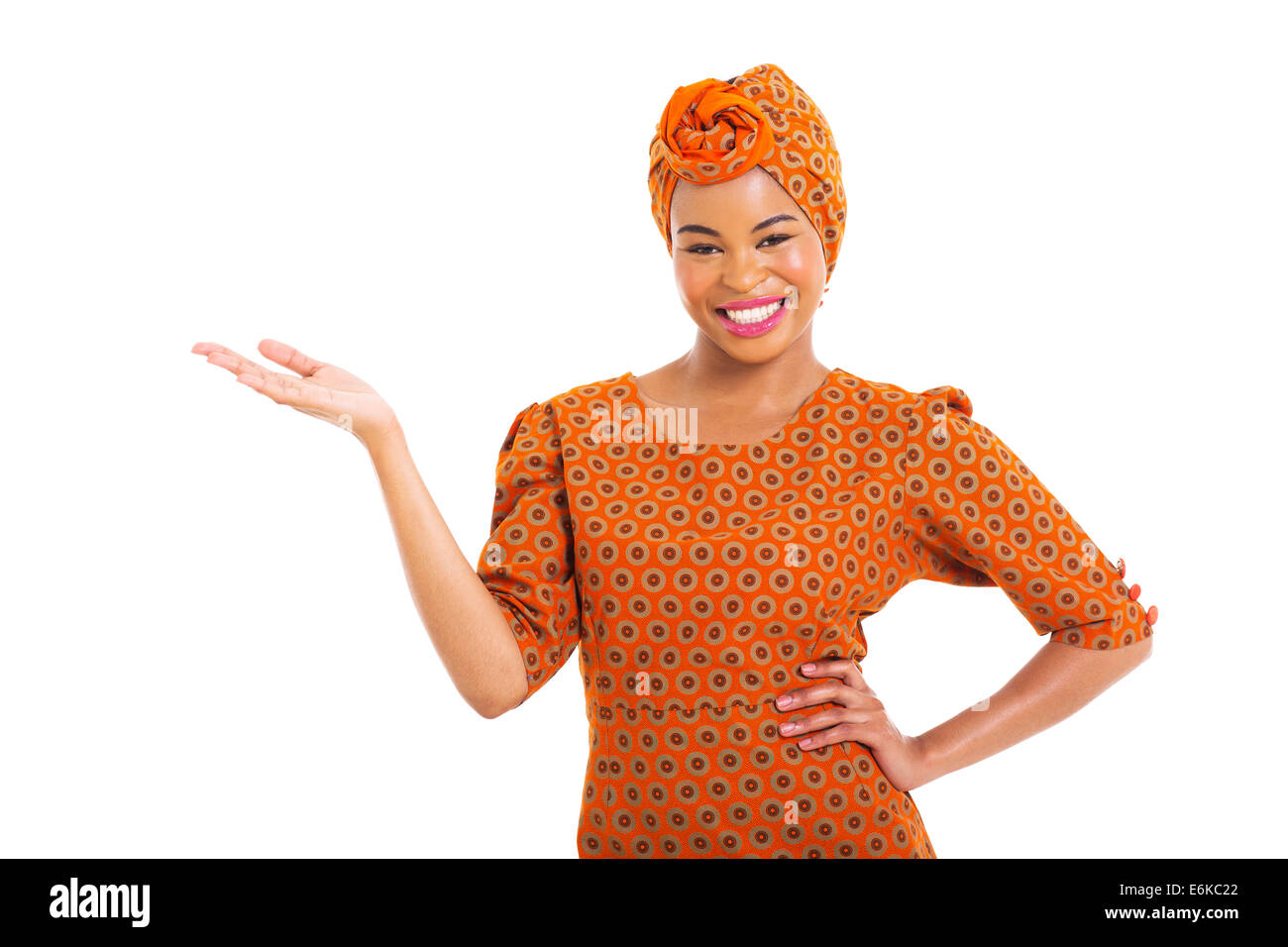 pretty African woman presenting on white background Stock Photo - Alamy