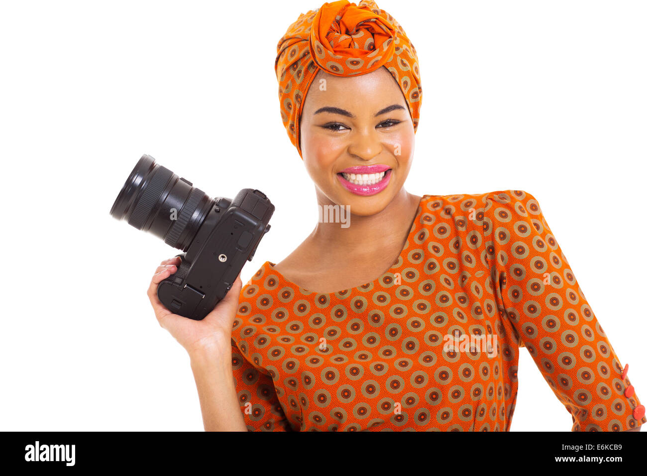 pretty African woman holding a digital SLR camera isolated on white ...