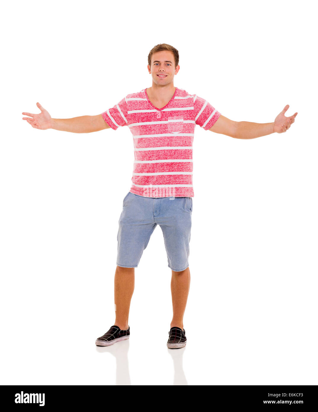 cute young man with arms open on white background Stock Photo - Alamy