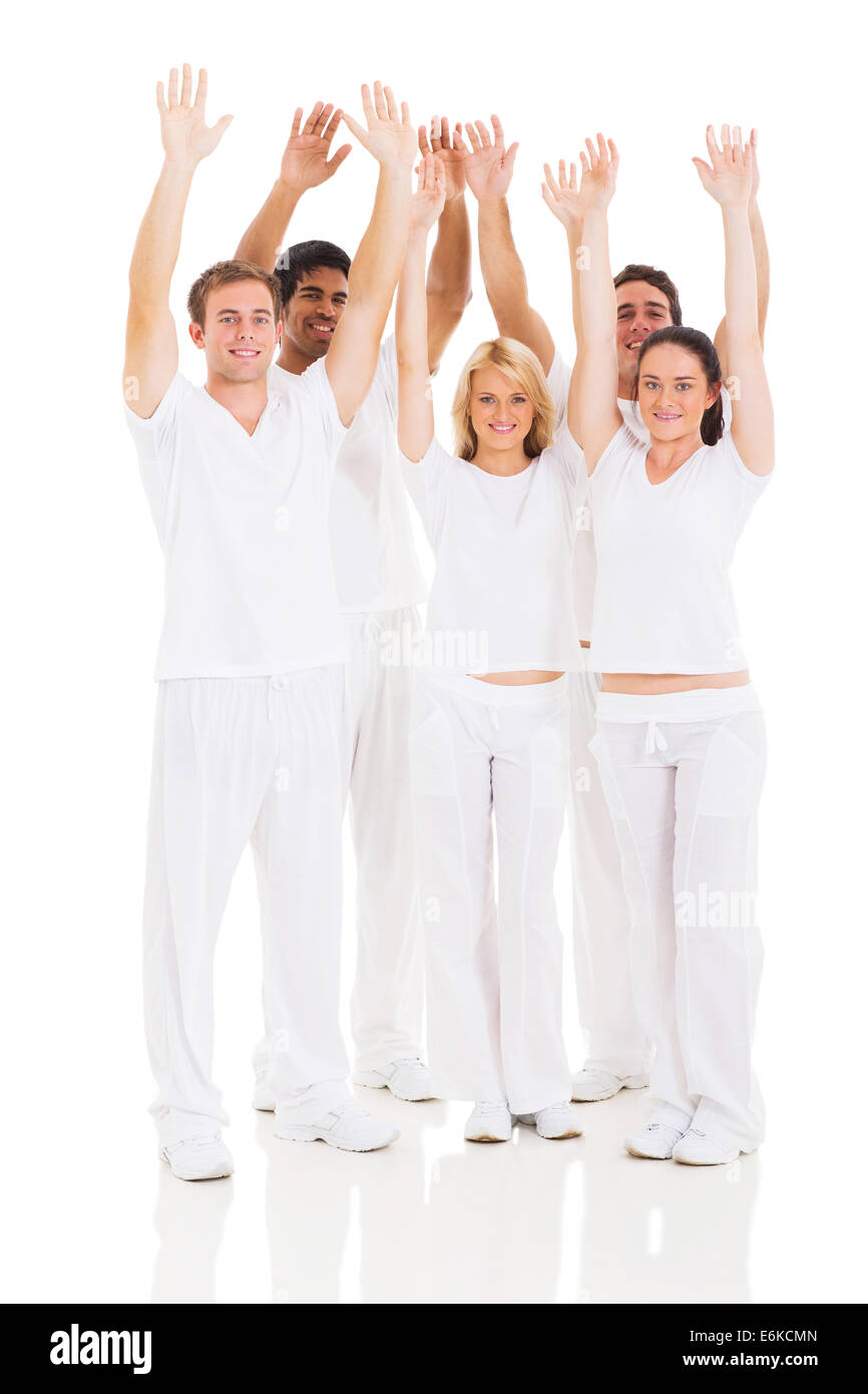 group of cheerful multiracial friends raising hands on white background ...