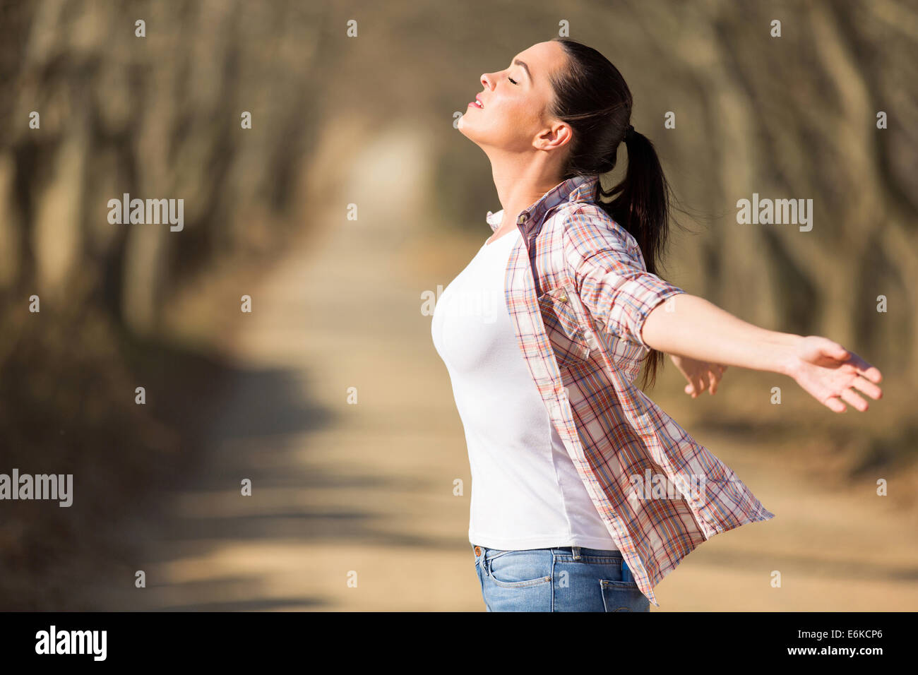 Woman young arms outstretched hi-res stock photography and images - Alamy