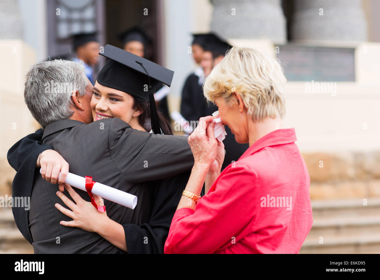 Mother father daughter graduation hi-res stock photography and images ...