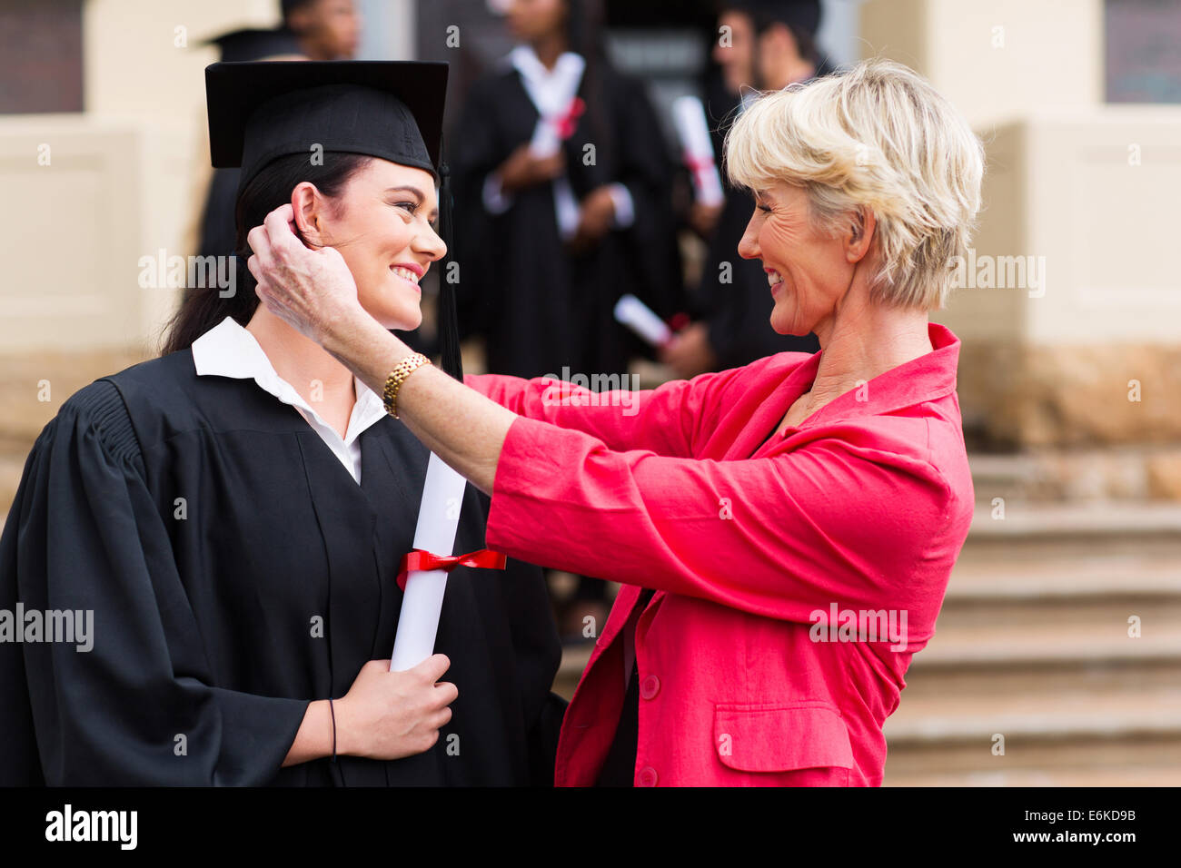 Daughter hugging college graduate hi-res stock photography and images ...