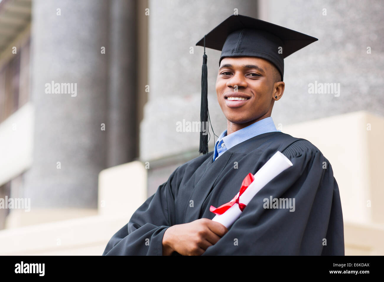 Male college graduate posing outdoors hi-res stock photography and ...