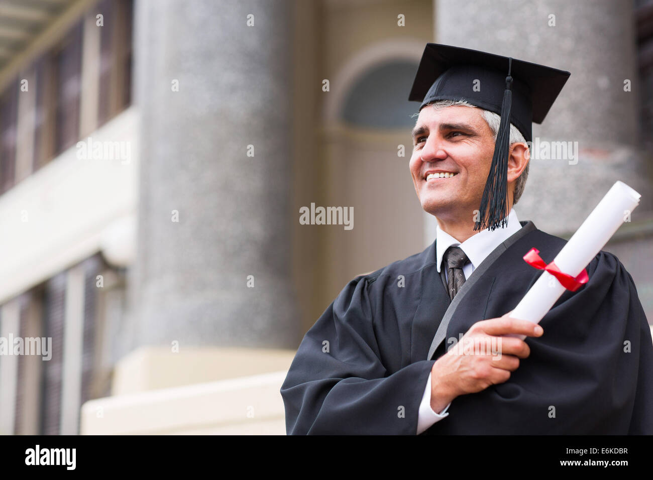 Man holding degree certificate hi-res stock photography and images - Alamy
