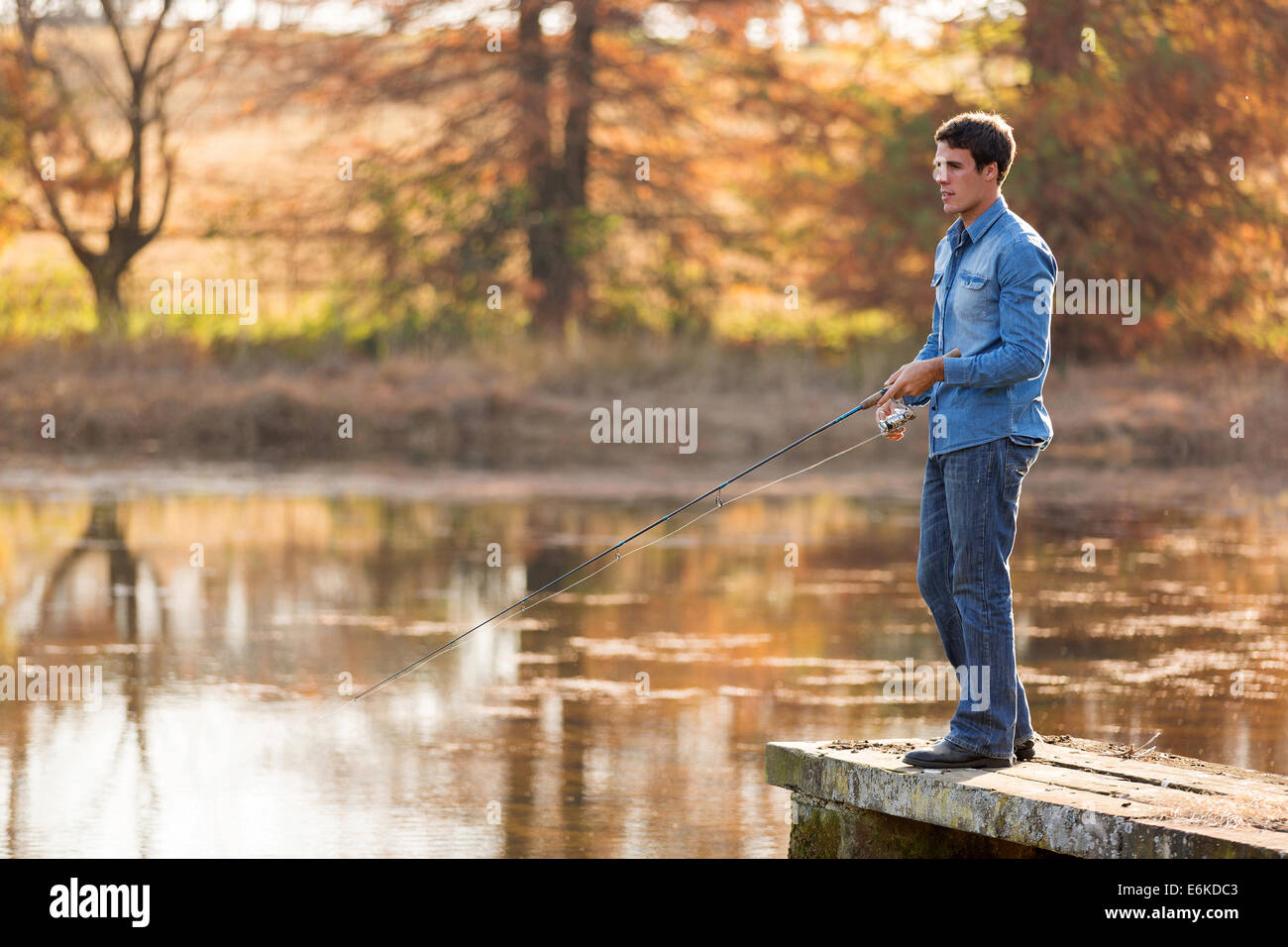 A young man fishing shirt hi-res stock photography and images - Alamy
