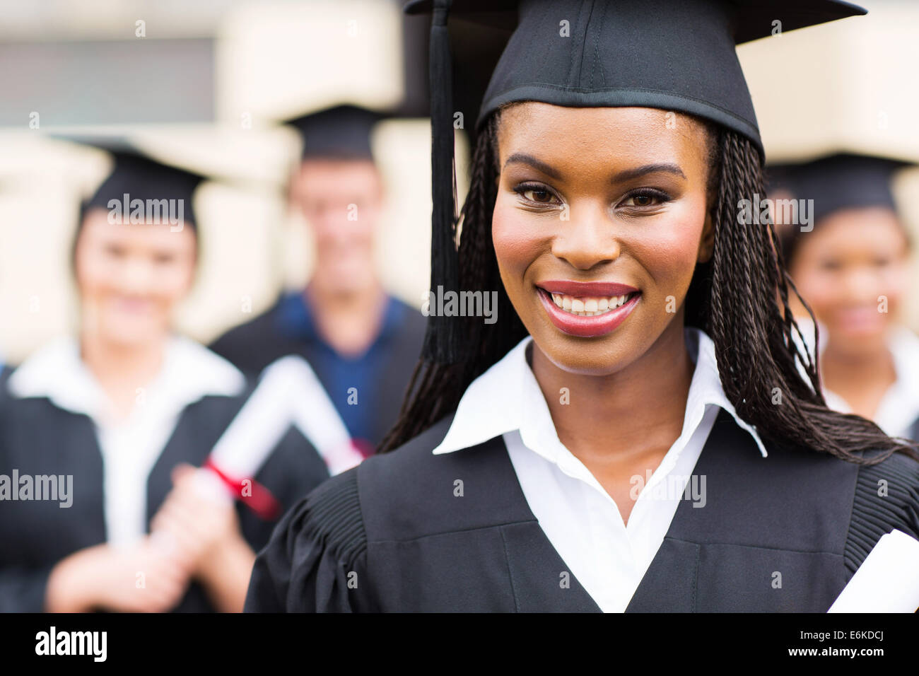 close up portrait of African American female graduate in front of ...