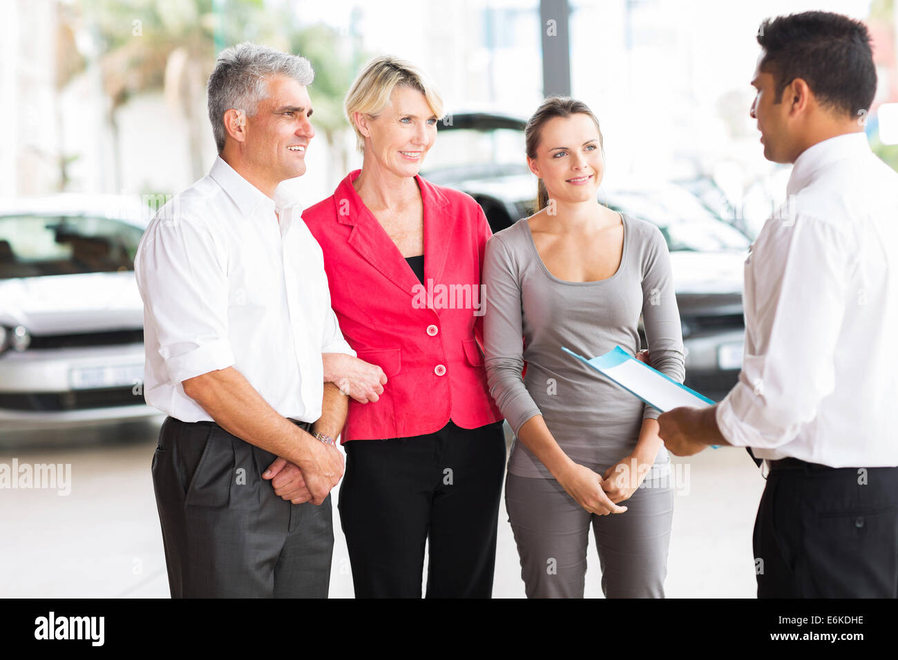 Young woman salesman in showroom hi-res stock photography and images ...