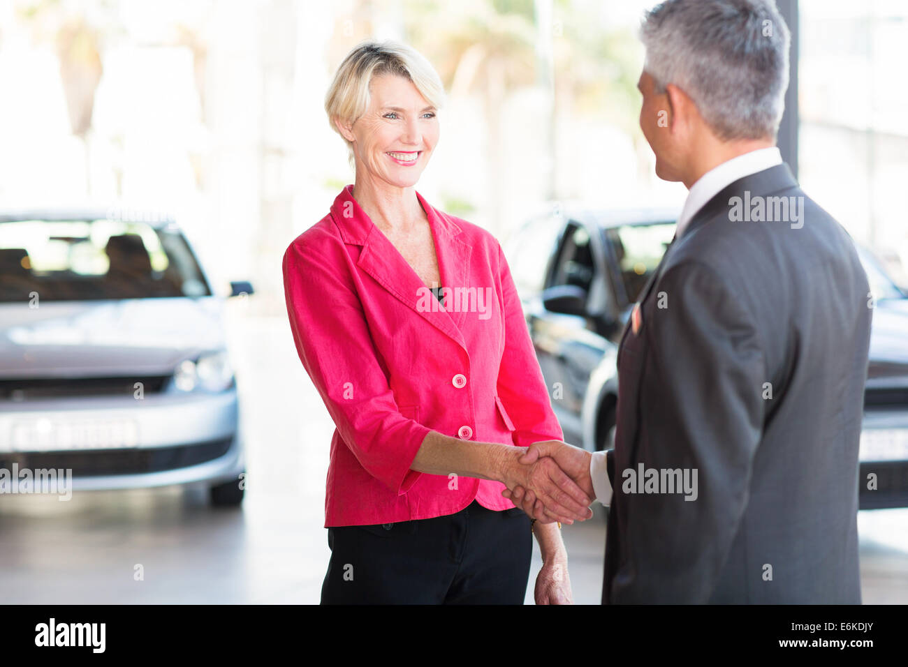 Beautiful mature woman selling hi-res stock photography and images - Alamy