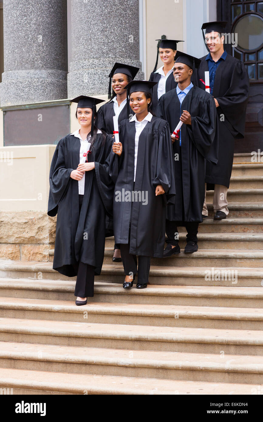 group of young graduates walking down the stairs after ceremony Stock ...