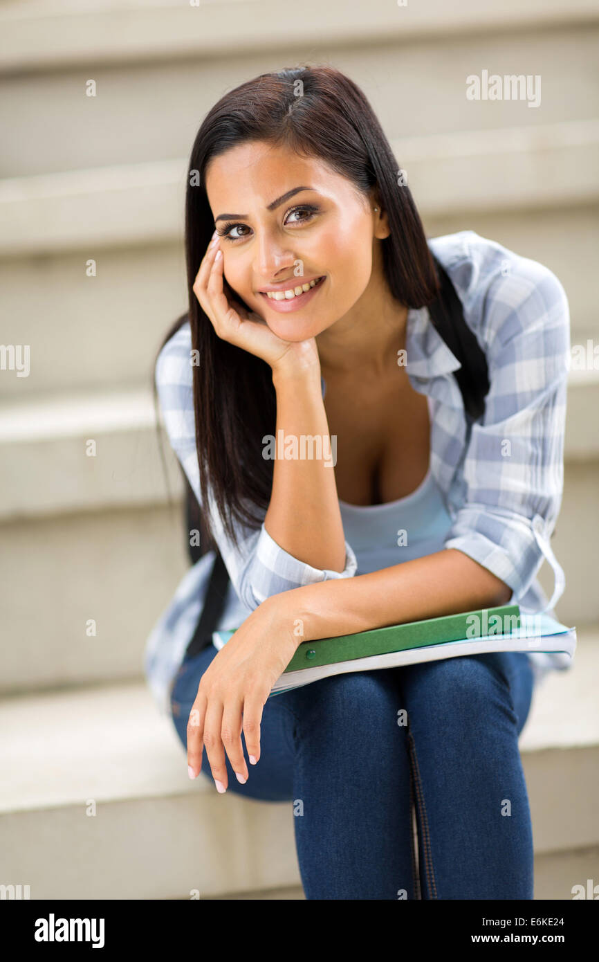 gorgeous young female college student sitting outdoors Stock Photo - Alamy