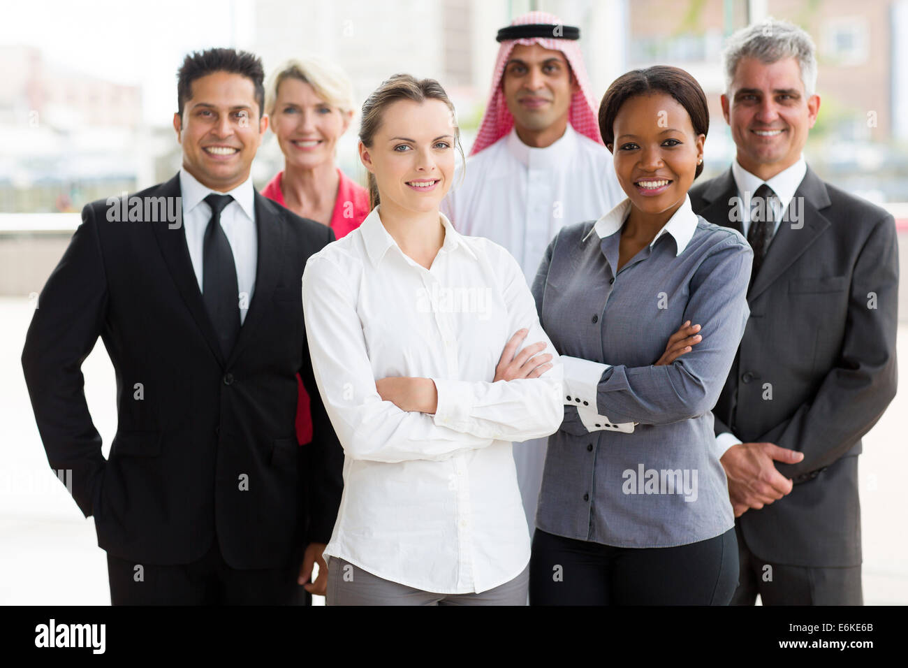 portrait of smiling multiracial business team in office Stock Photo - Alamy