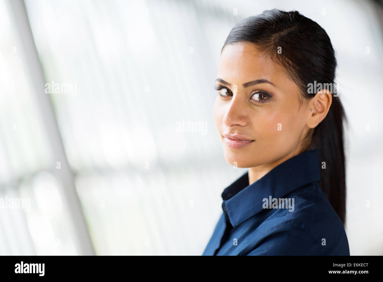 pretty young entrepreneur looking at the camera Stock Photo - Alamy