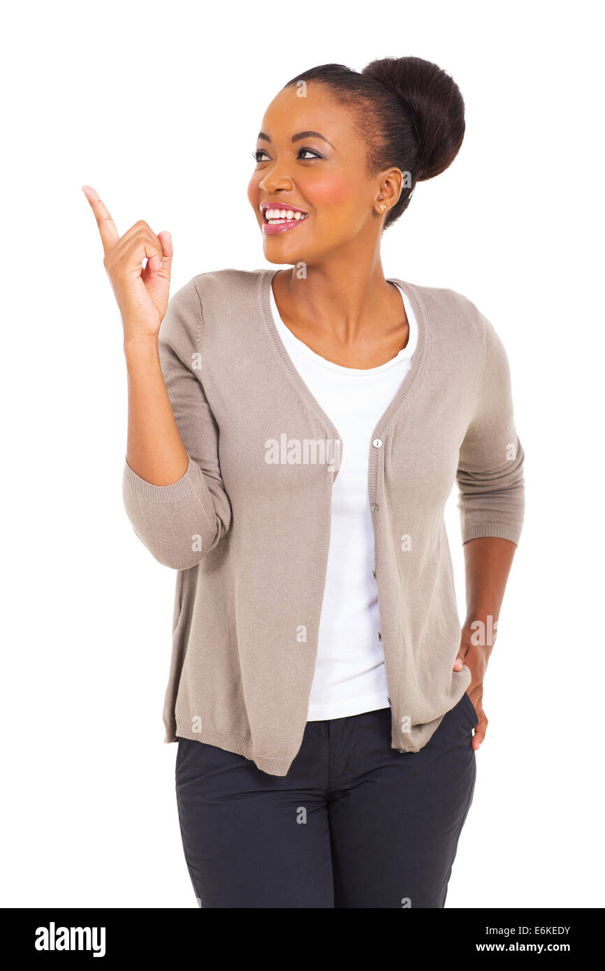 cheerful African woman pointing up isolated on white background Stock ...