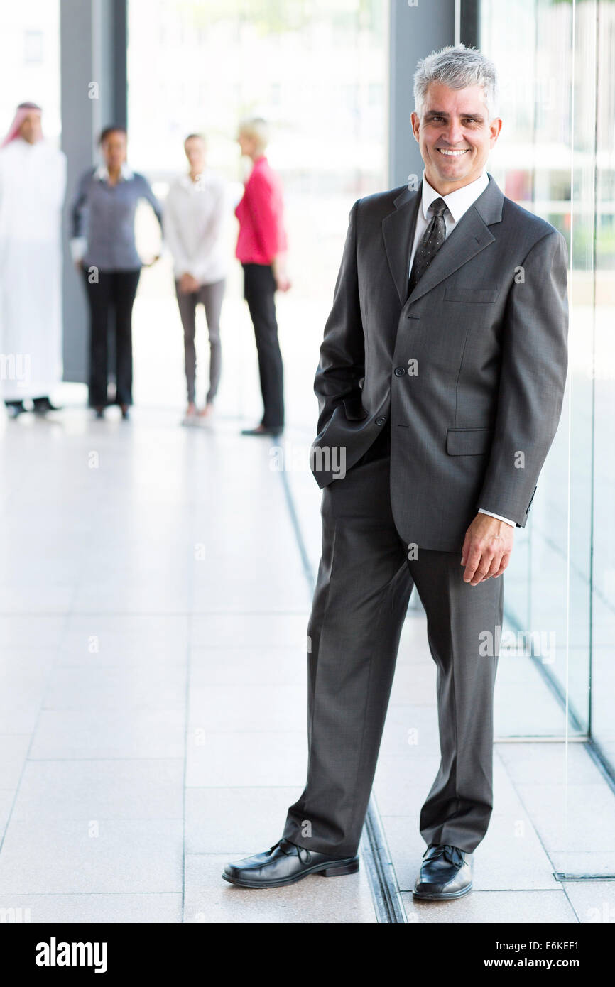 modern middle aged businessman portrait in office Stock Photo - Alamy