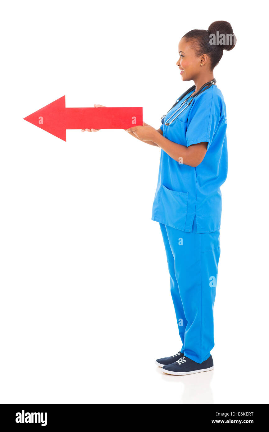 side view of afro American nurse holding red arrow Stock Photo - Alamy