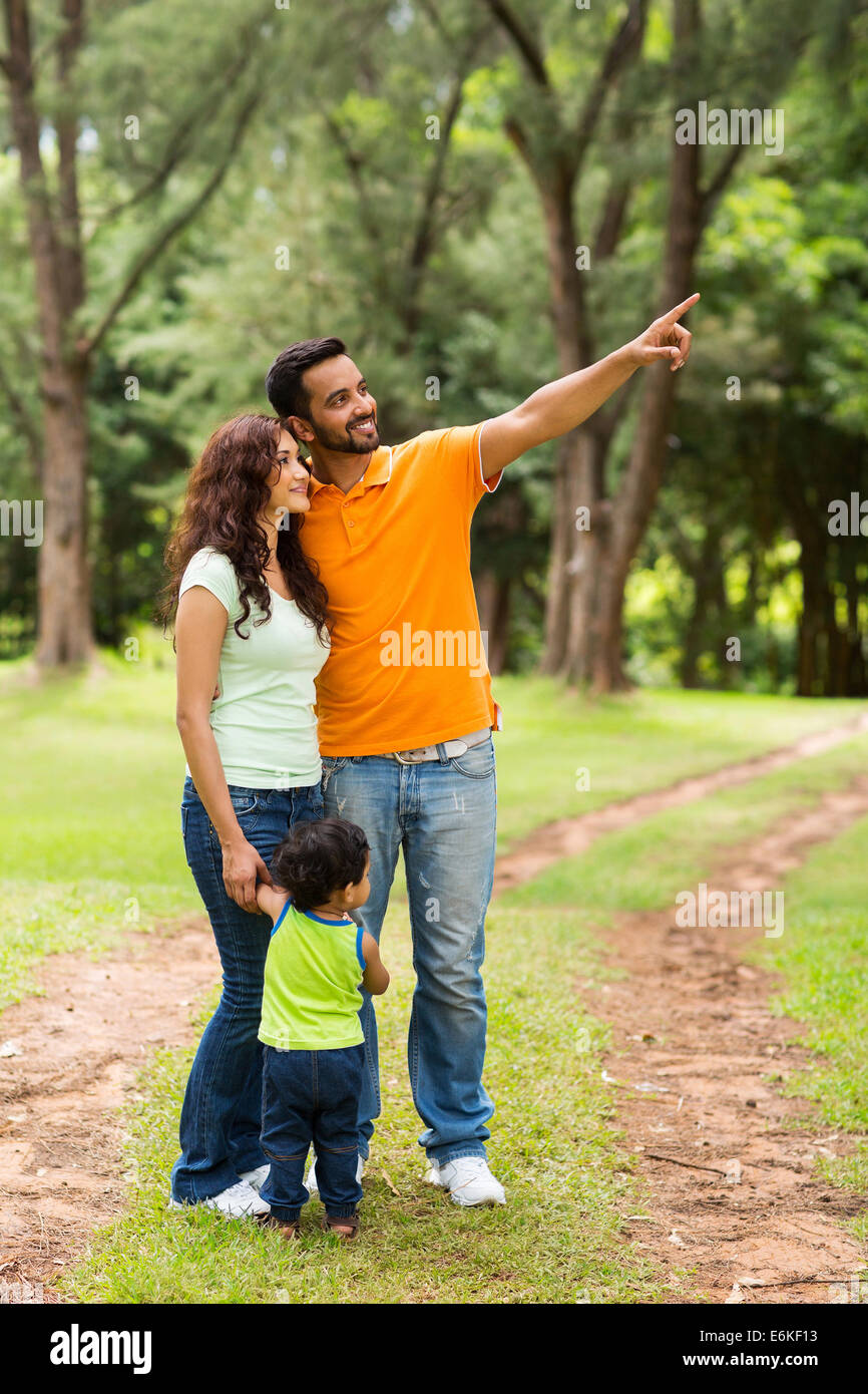 young Indian family relaxing outdoors in forest Stock Photo - Alamy
