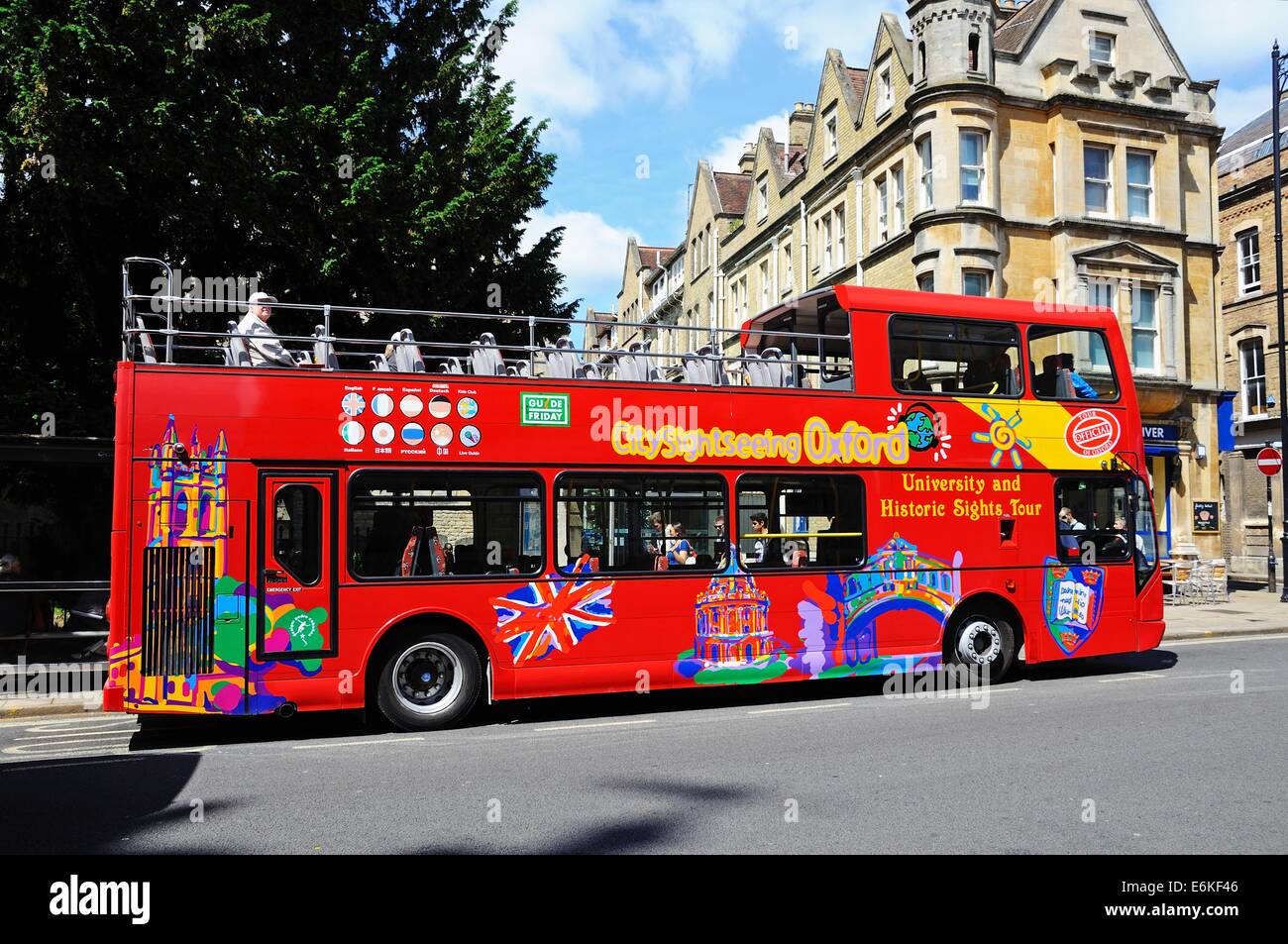 Red open topped Oxford tour bus along St Aldates, Oxford, Oxfordshire ...