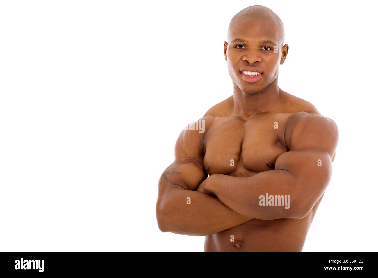 close up portrait of African bodybuilder with arms crossed Stock Photo ...
