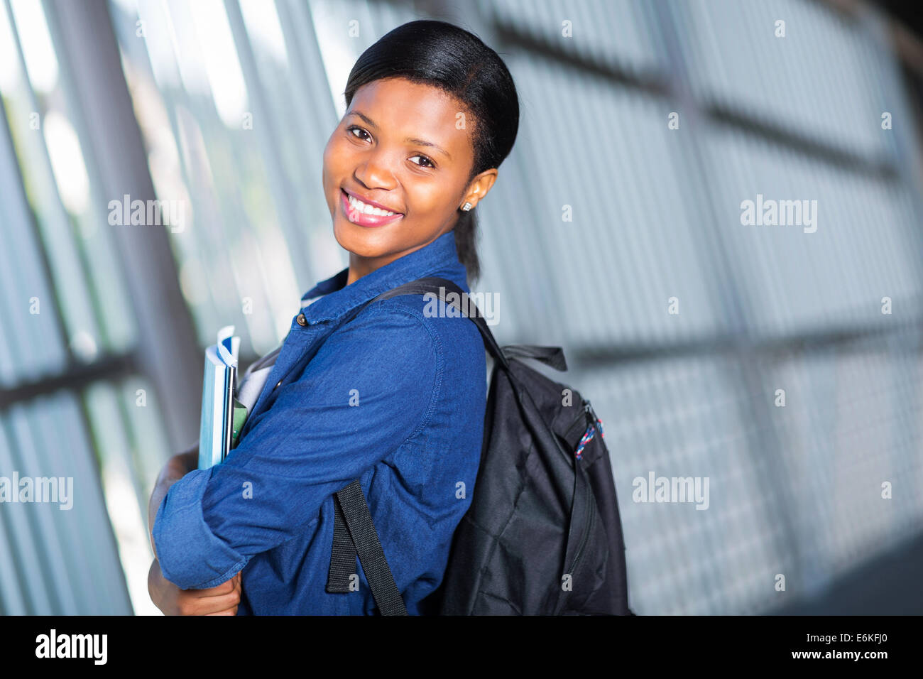 pretty African American college student posing on campus Stock Photo ...