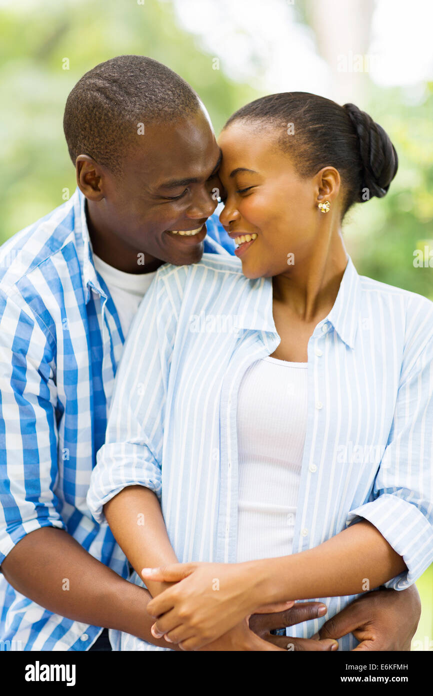adorable African couple hugging outdoors Stock Photo - Alamy