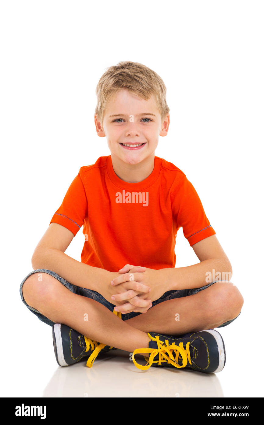 adorable child sitting on the floor isolated on white background Stock ...