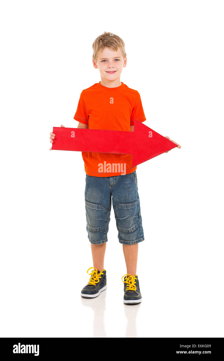 young boy holding big direction arrow on white background Stock Photo ...
