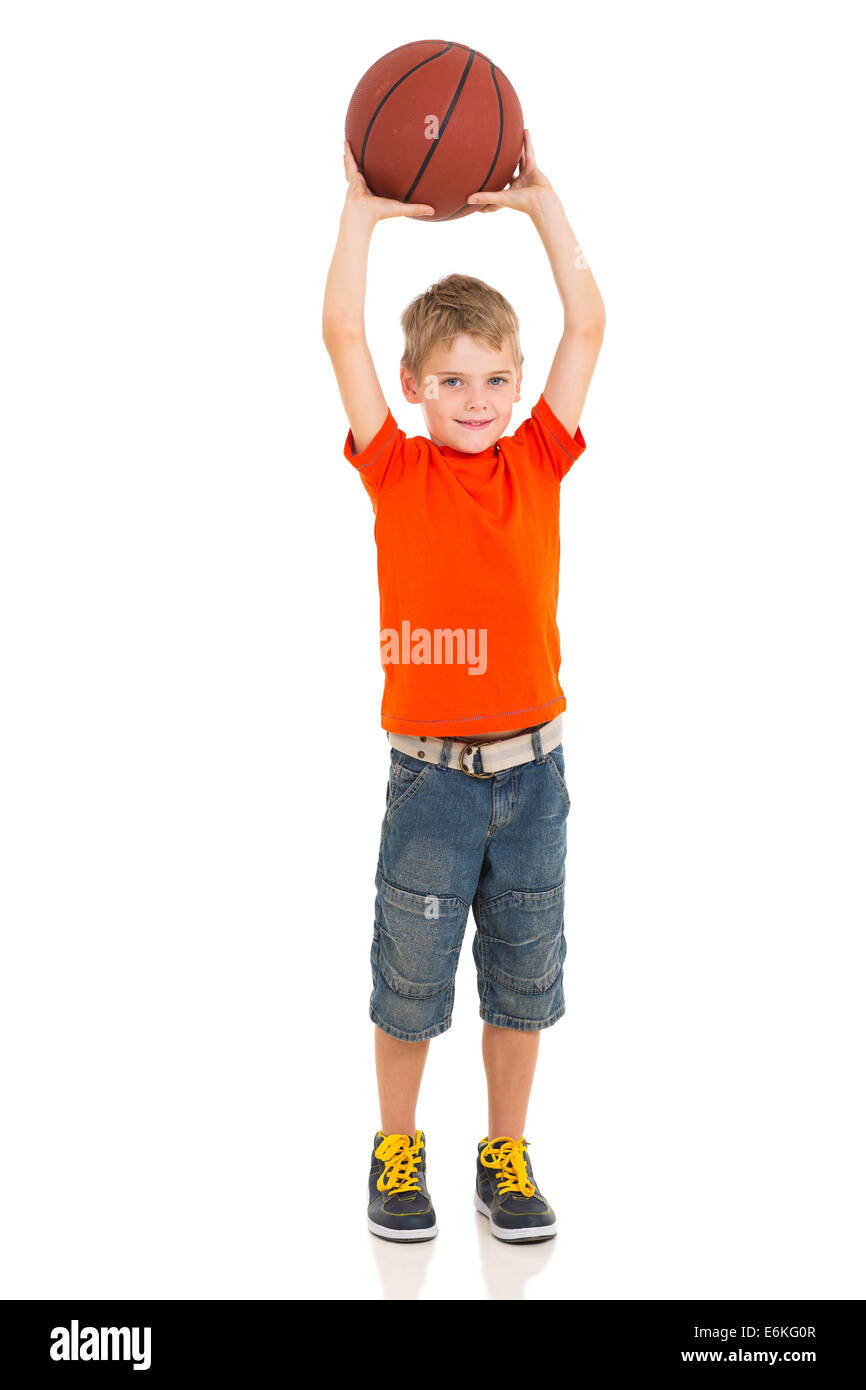young boy playing basketball on white background Stock Photo - Alamy