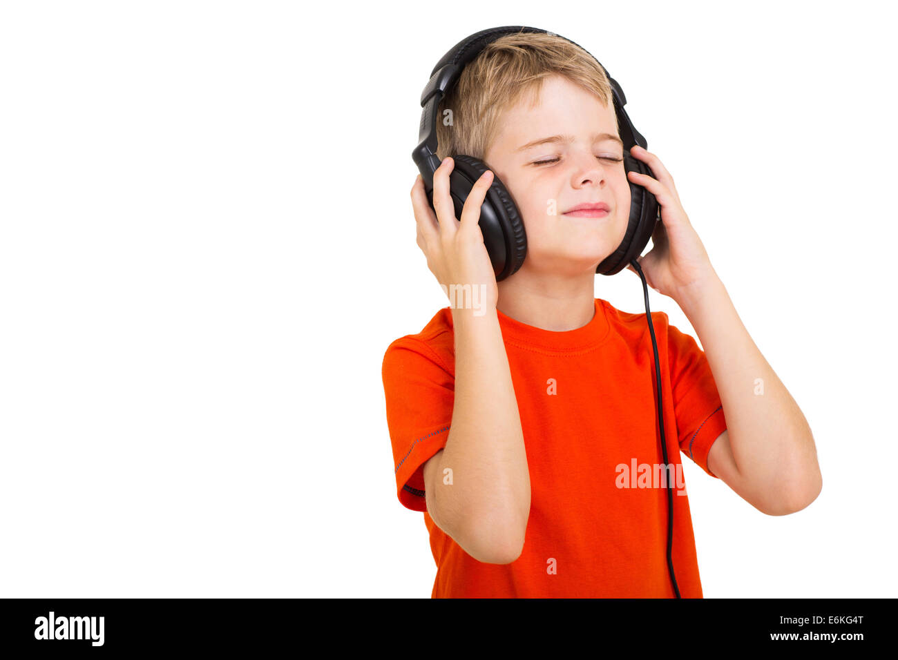 cute boy listening to music with headphones Stock Photo - Alamy
