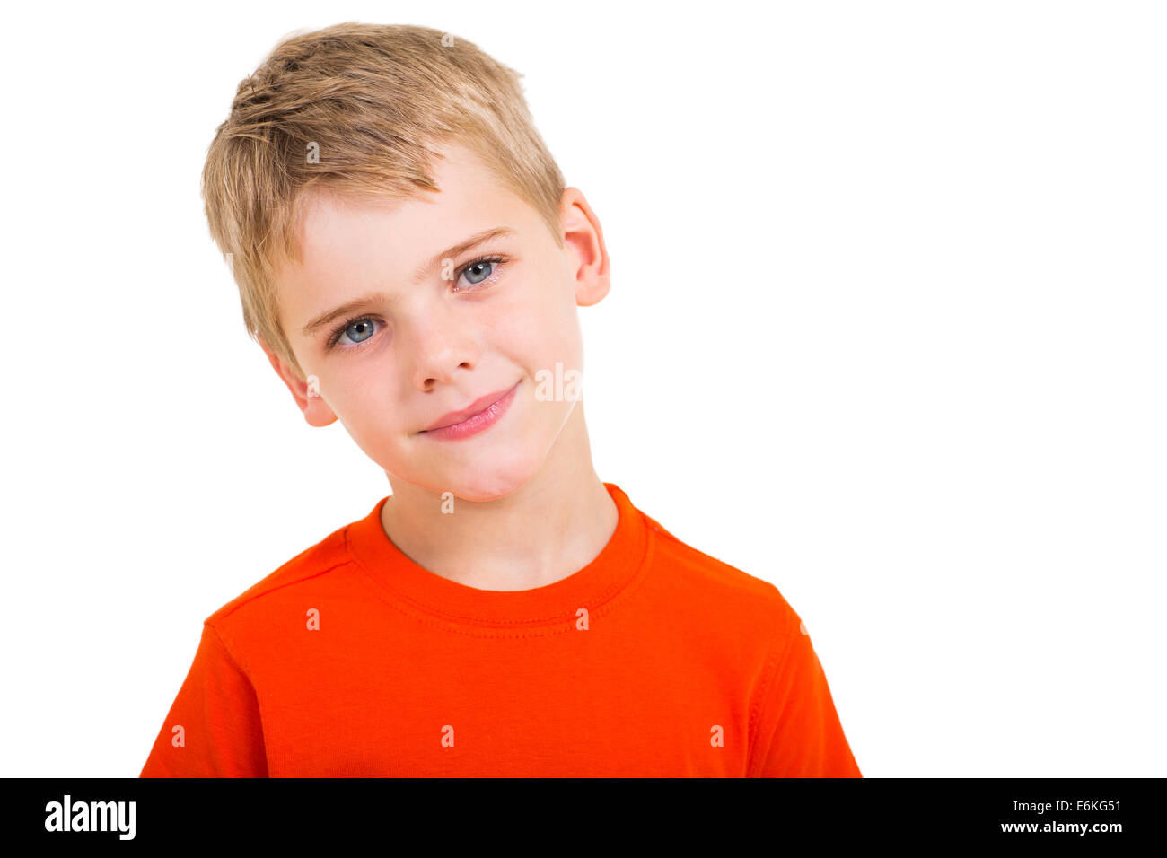 innocent little boy looking at the camera isolated on white background ...