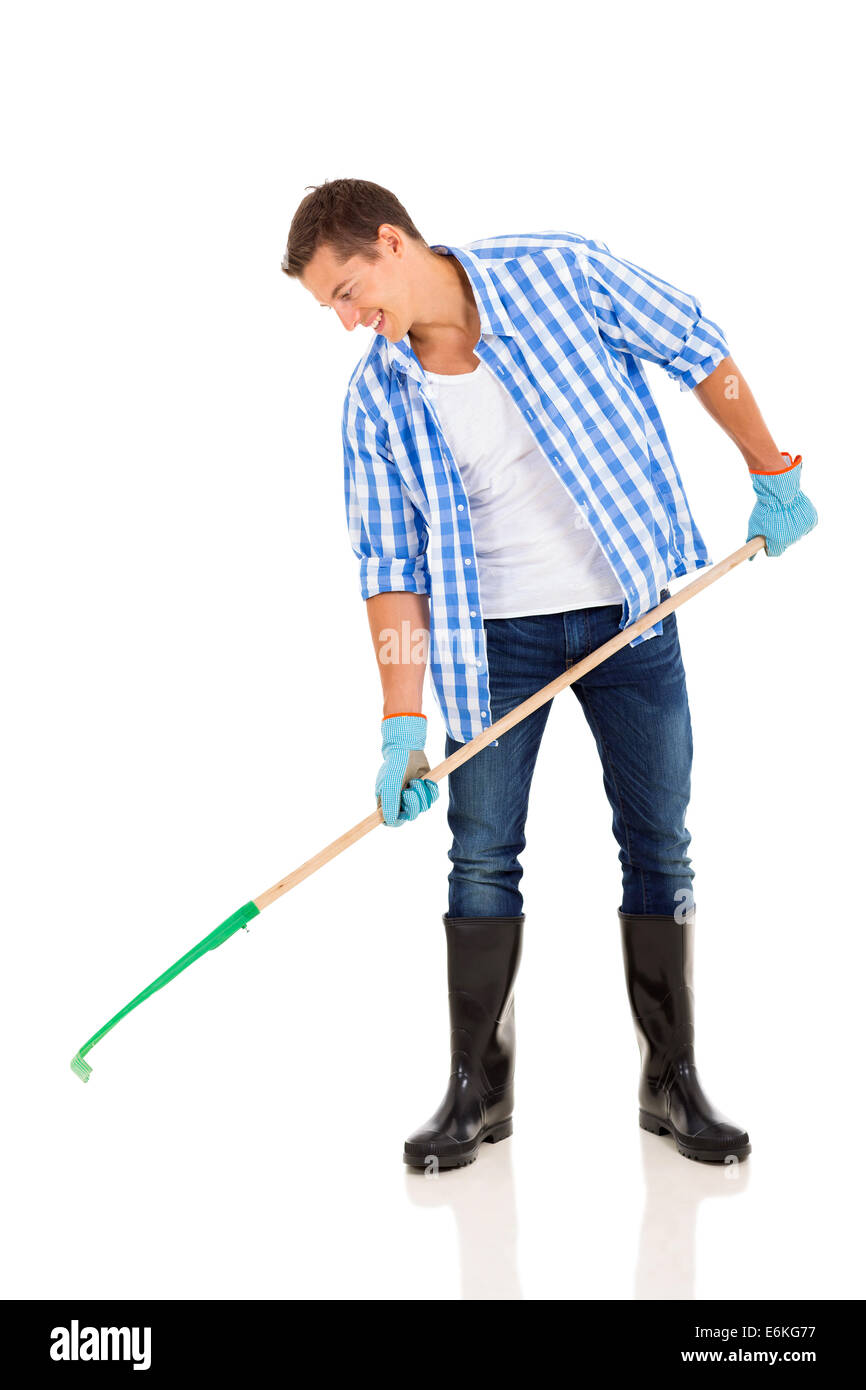 young man raking isolated on white background Stock Photo - Alamy