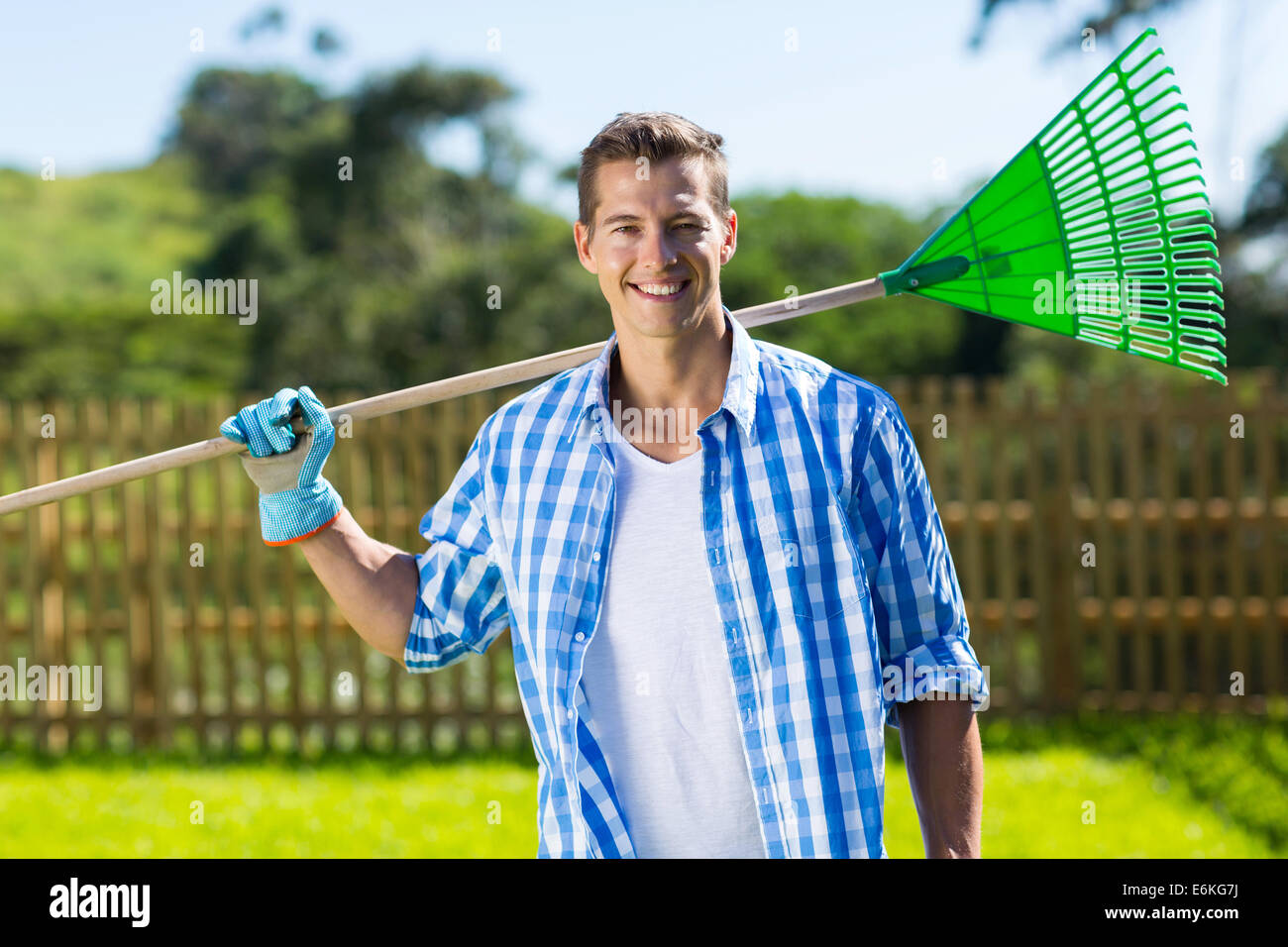 Holding rake hi-res stock photography and images - Alamy