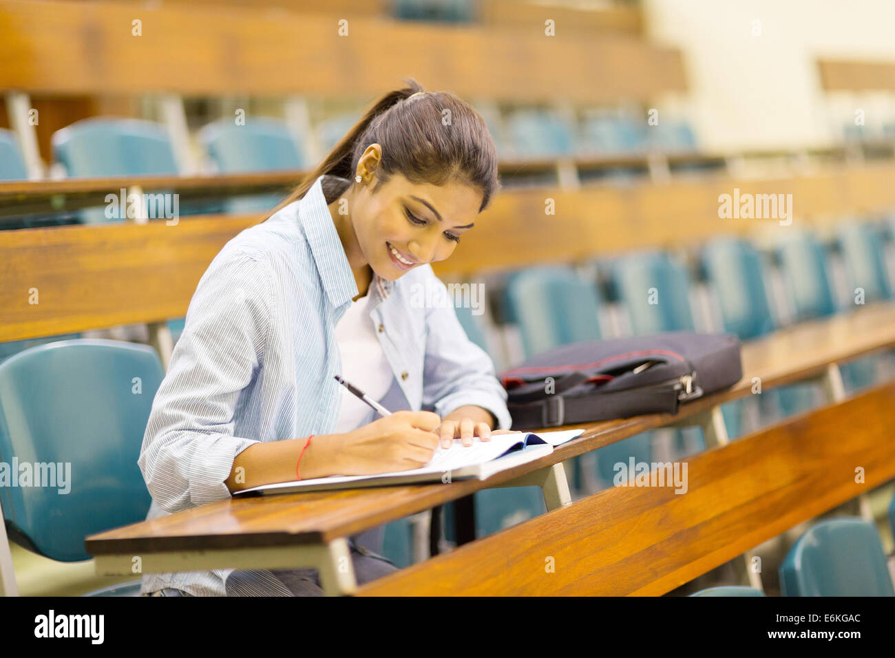 happy university student studying in lecture room Stock Photo - Alamy