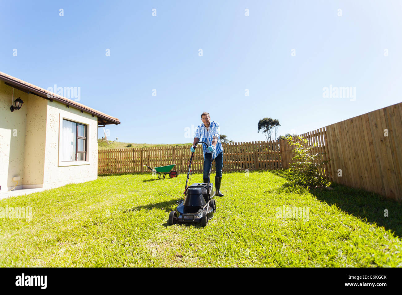 Young cheerful guy home hi-res stock photography and images - Alamy